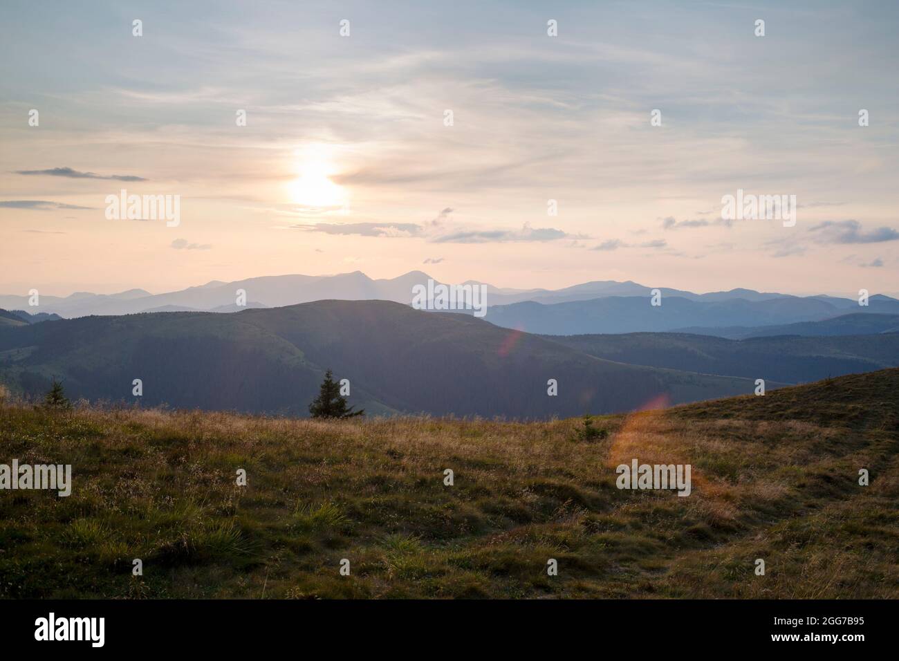 Beautiful sunset in the alpine zone of the Carpathians above the Rodna ...