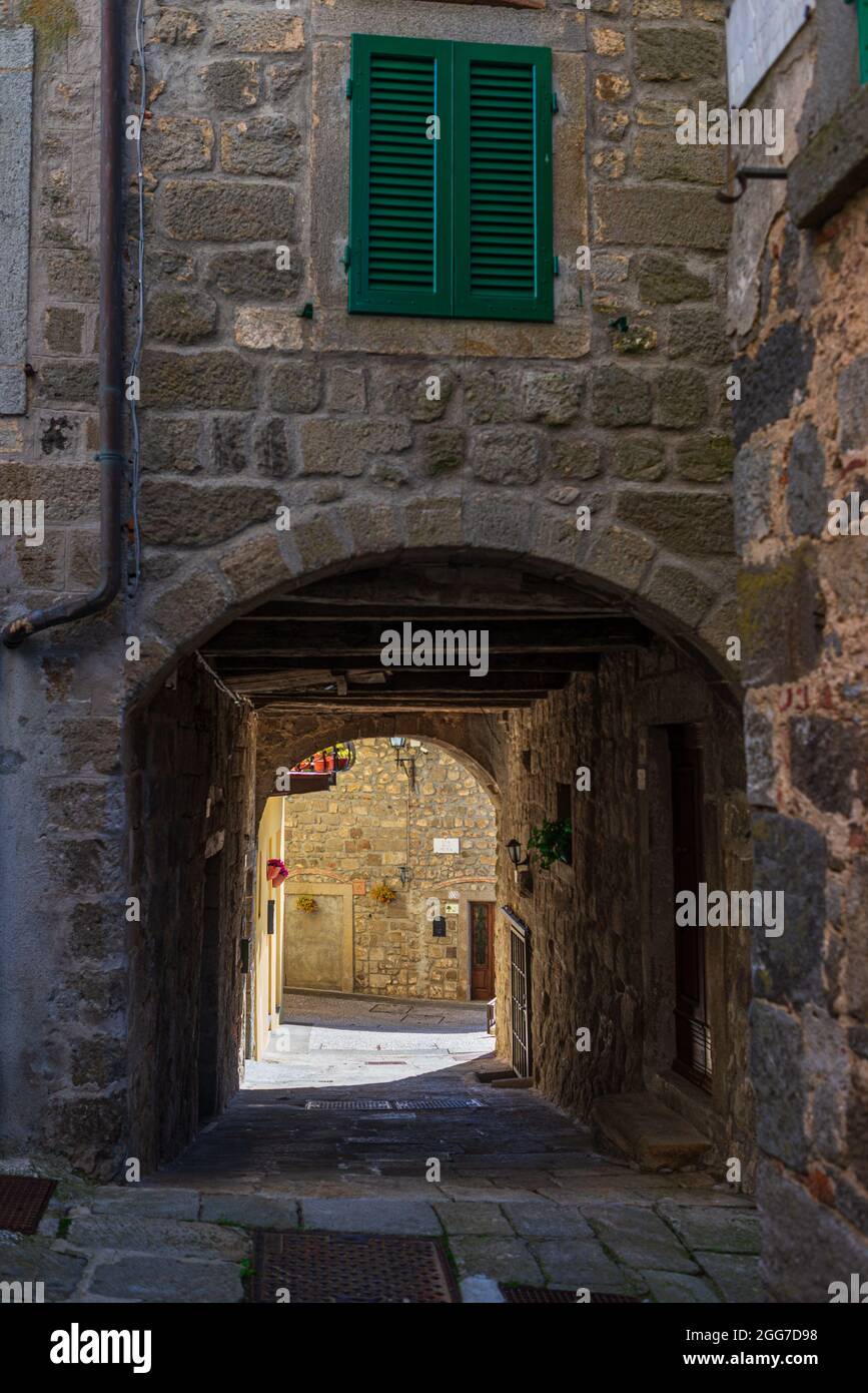 Italian medieval village details, historical stone arch, ancient gate ...
