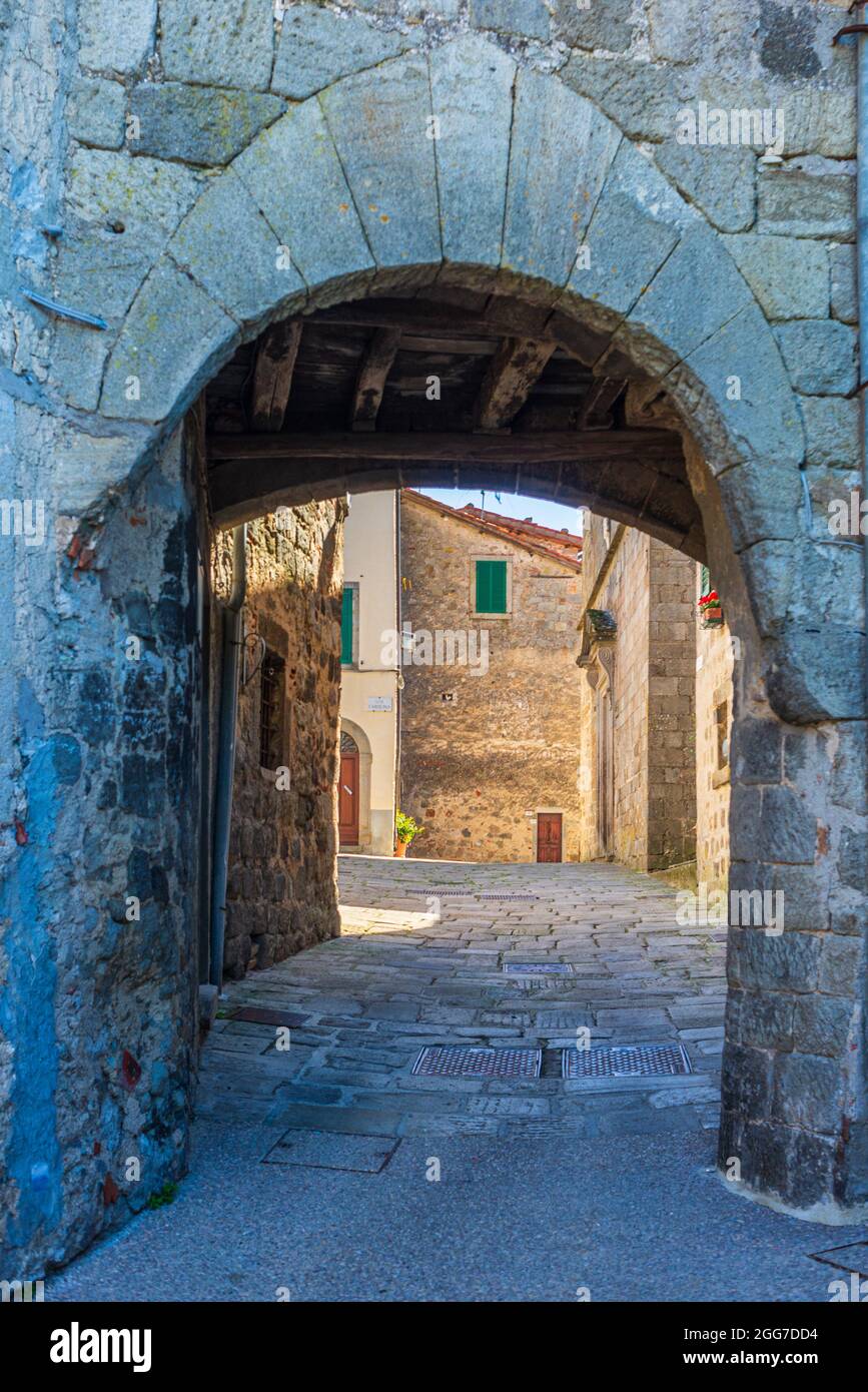 Italian medieval village details, historical stone arch, ancient gate ...