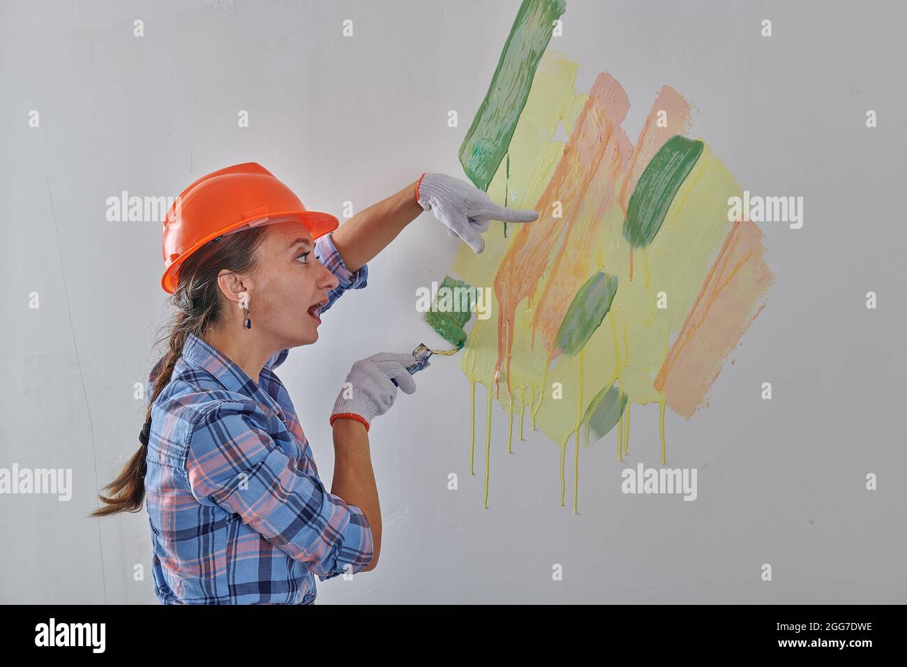shocked designer tries colors for the walls Stock Photo - Alamy