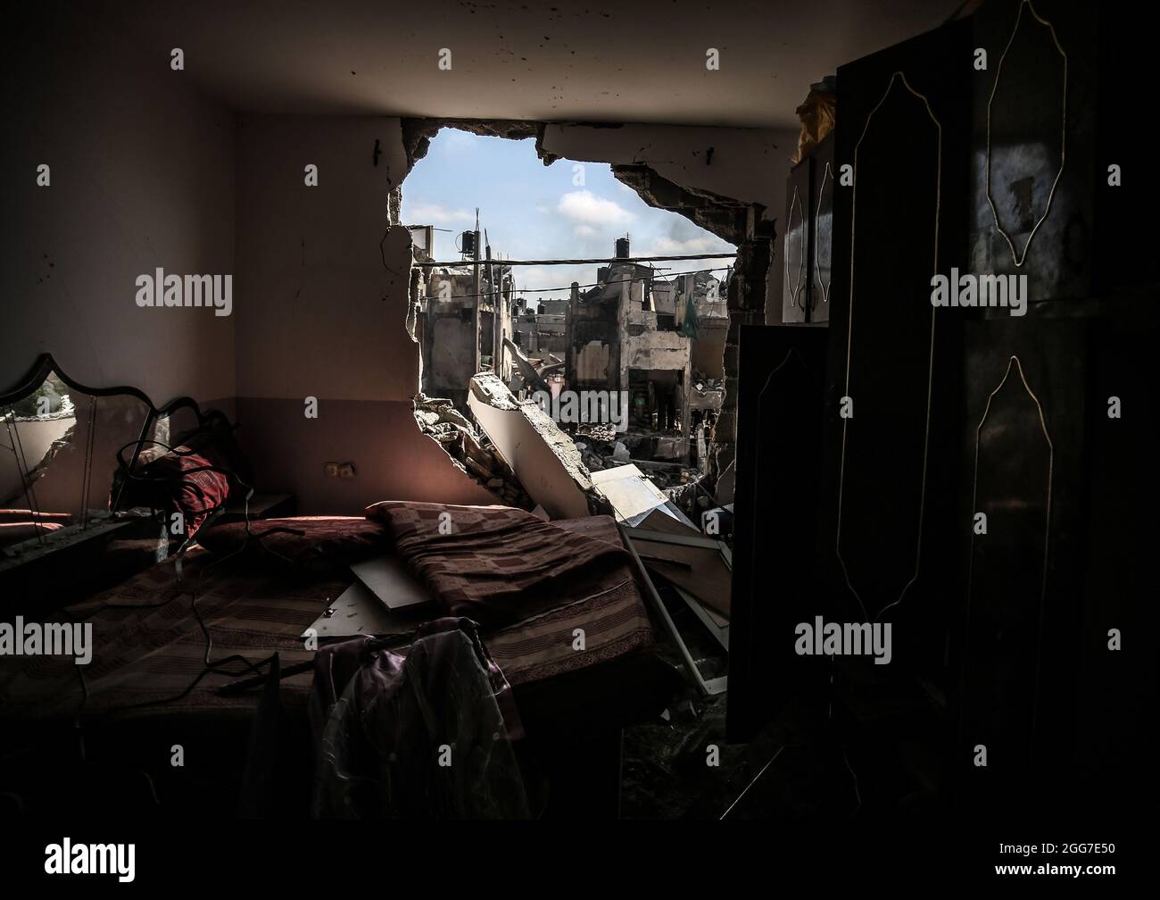 A damage at a destroyed house that was hit by an Israeli air strike in ...