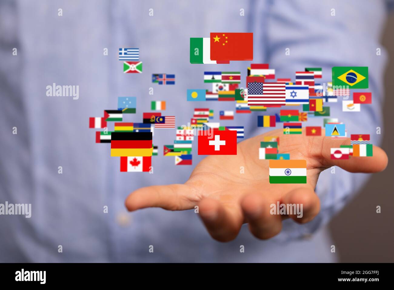 A digital illustration of floating flags on a hand Stock Photo - Alamy