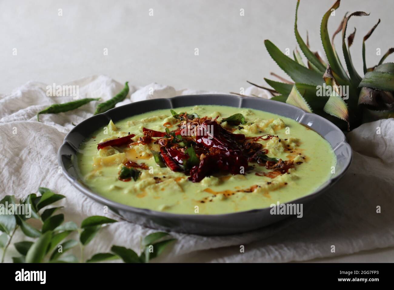 Pineapple pachadi. A yogurt based sweet and spicy curry made with ...