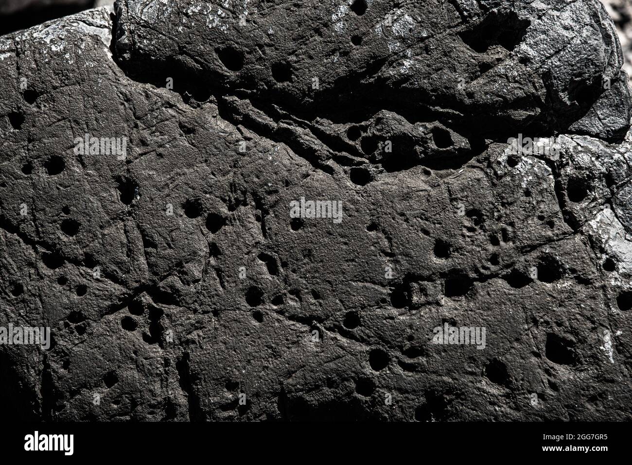 Black volcanic lava pattern texture hi-res stock photography and images ...