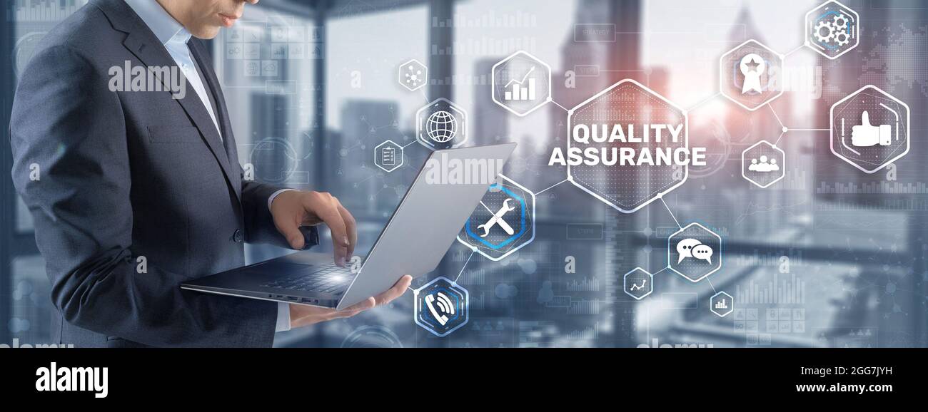 QA Businessman pressing Quality assurance button on virtual screens ...