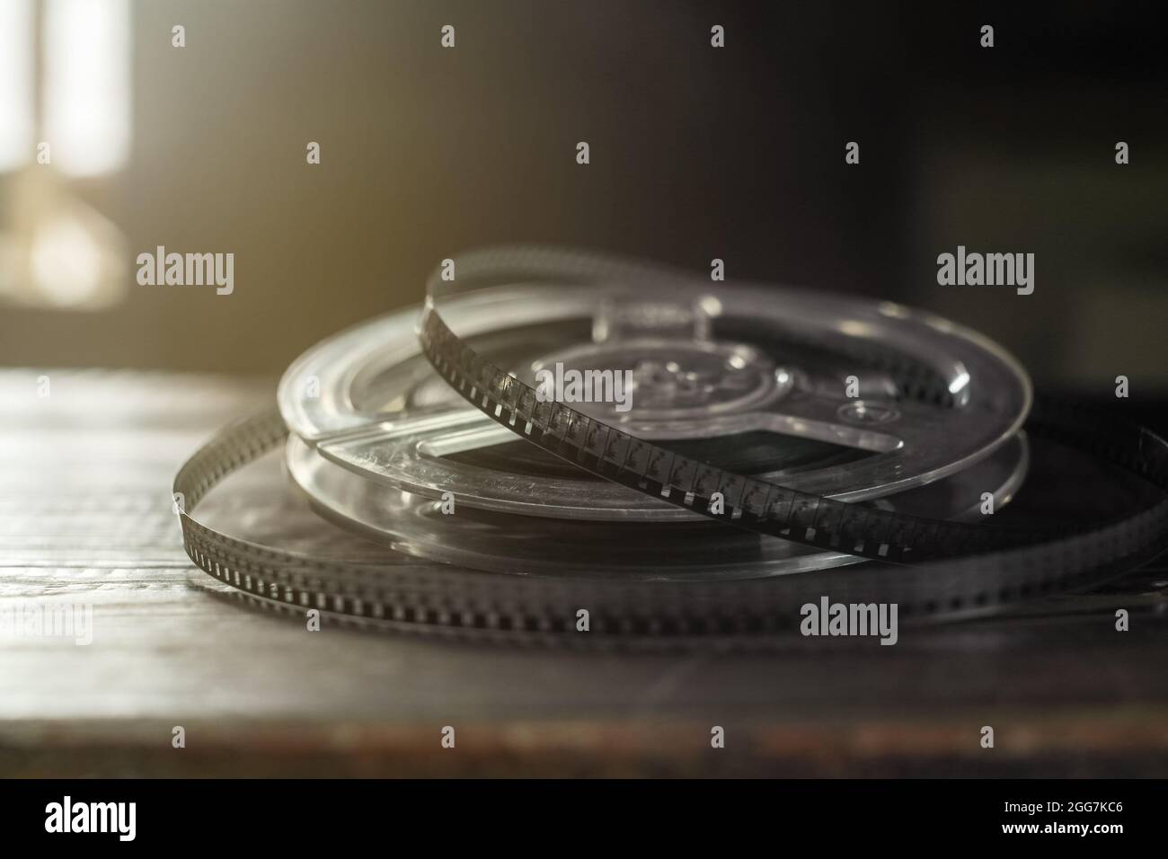 Old spools with black and white film stock. Retro style Stock Photo - Alamy