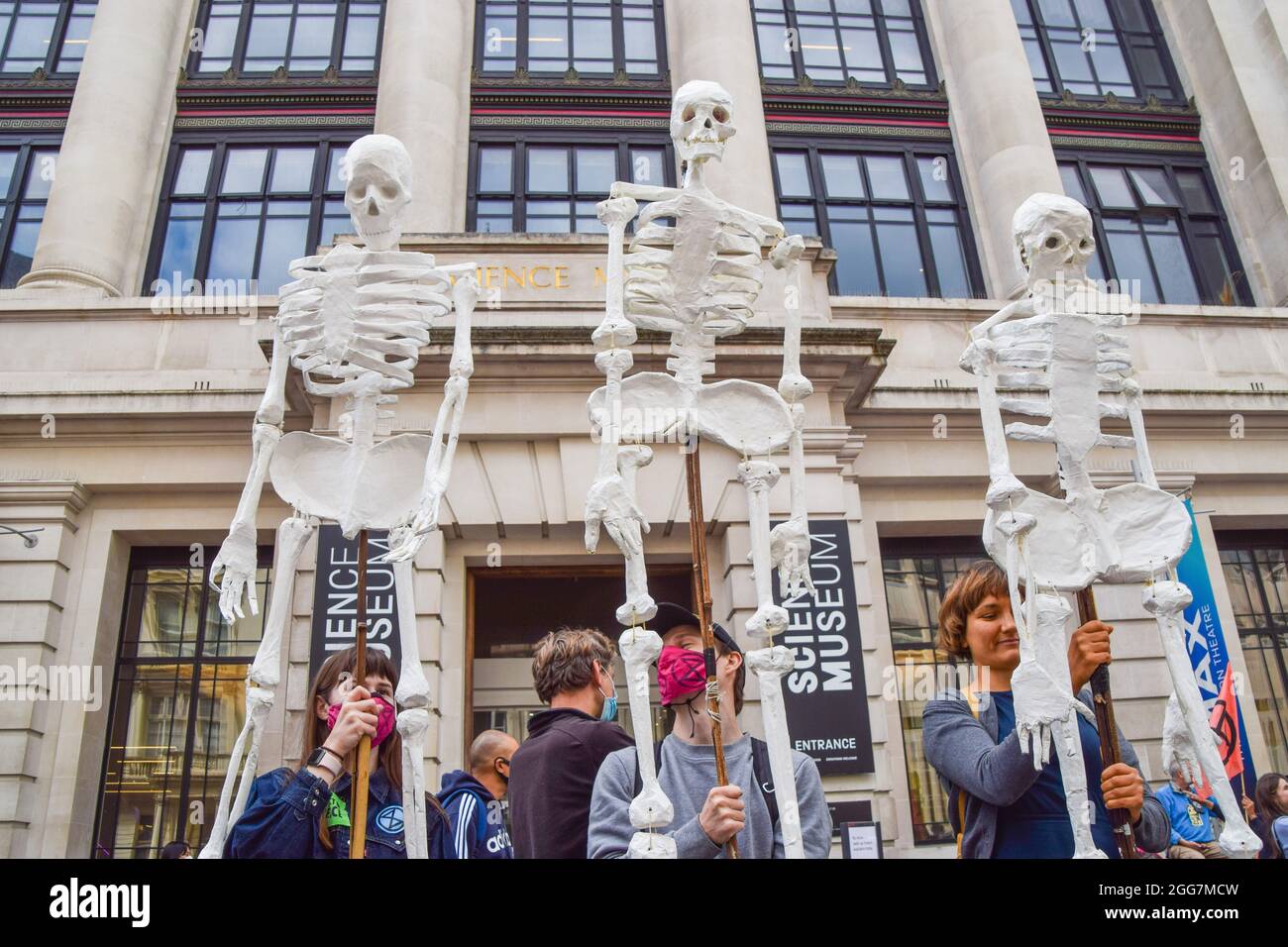 London, UK. 29th Aug, 2021. Protesters hold skeleton models during the ...