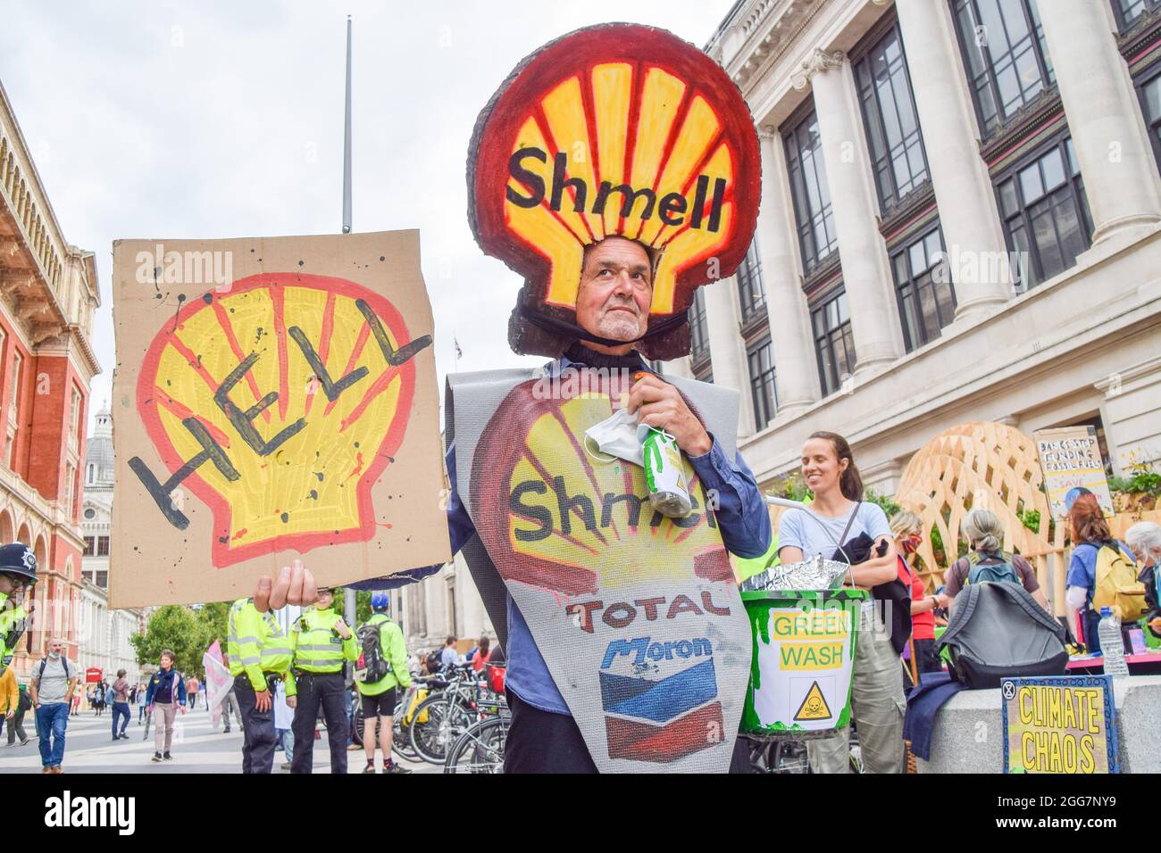 A protester wears an anti-Shell costume during the demonstration ...