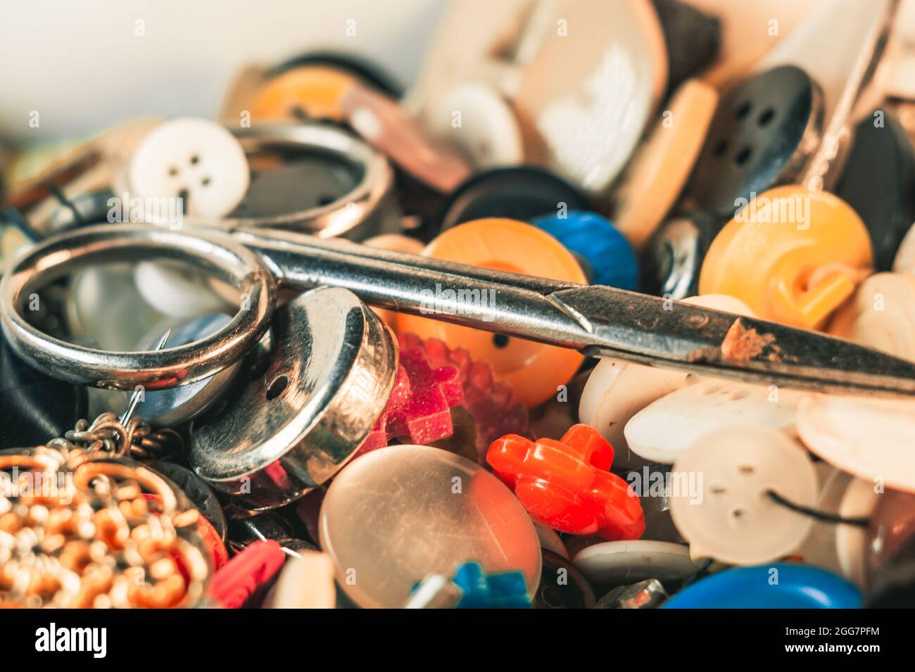 A selective shot of mix of cloth buttons of different color and size ...
