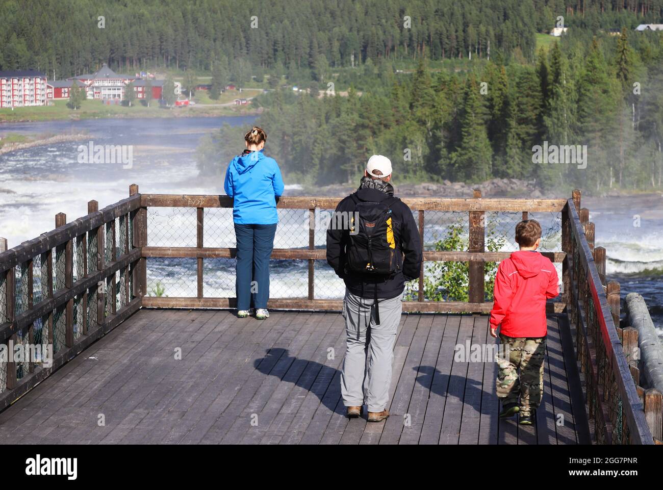 Vidsel, Sweden - August 23, 2021: A family visiting the Storforsen ...