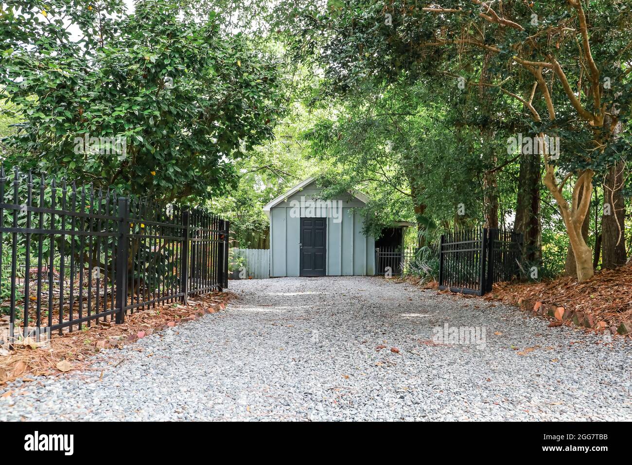 Blue outdoor shed wood building for storage Stock Photo - Alamy