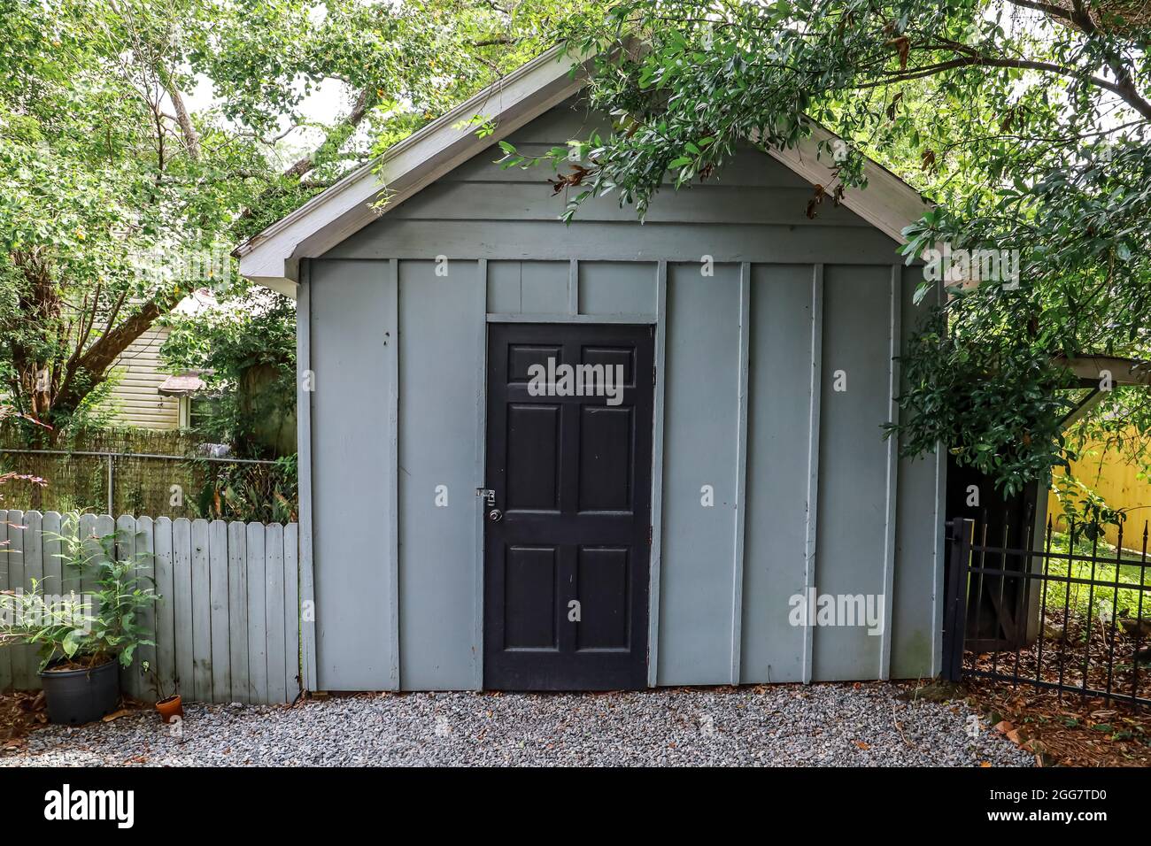 Blue outdoor shed wood building for storage Stock Photo - Alamy