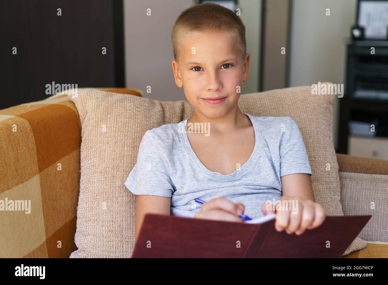 Teen boy reading letter hi-res stock photography and images - Alamy