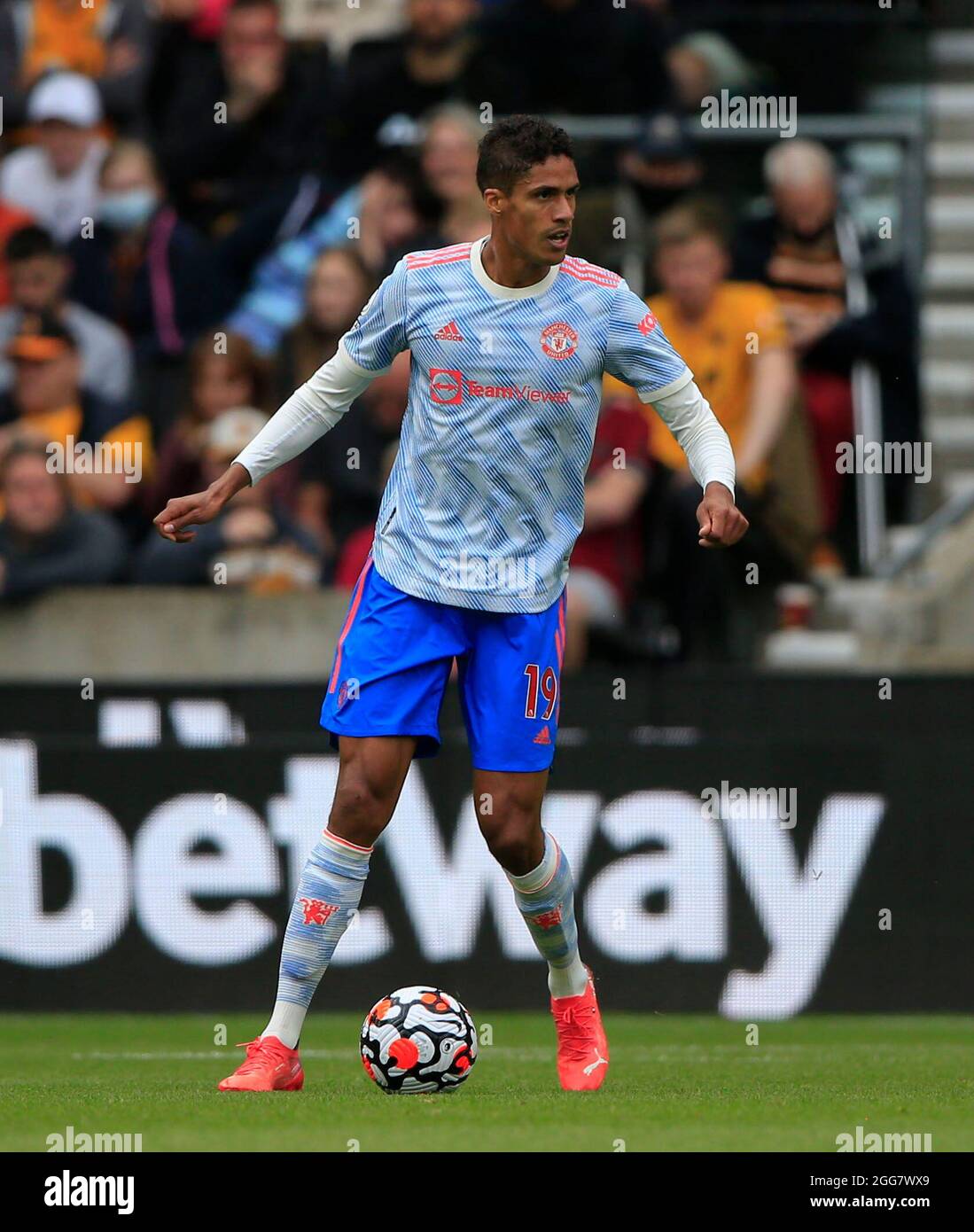 Raphael Varane #19 of Manchester United controls the ball Stock Photo ...