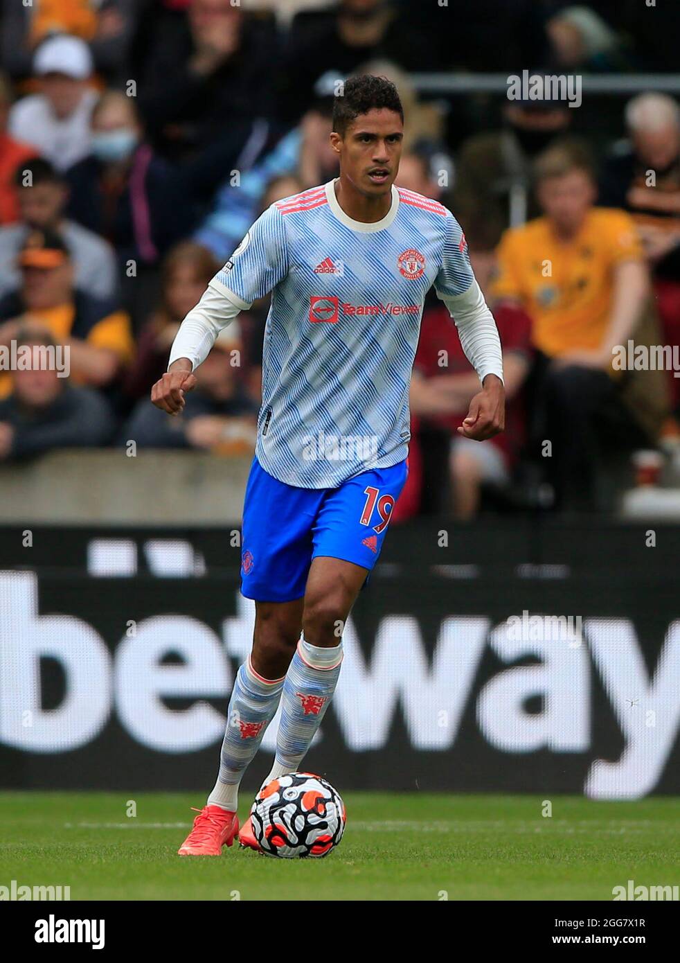 Raphael Varane #19 of Manchester United controls the ball Stock Photo ...