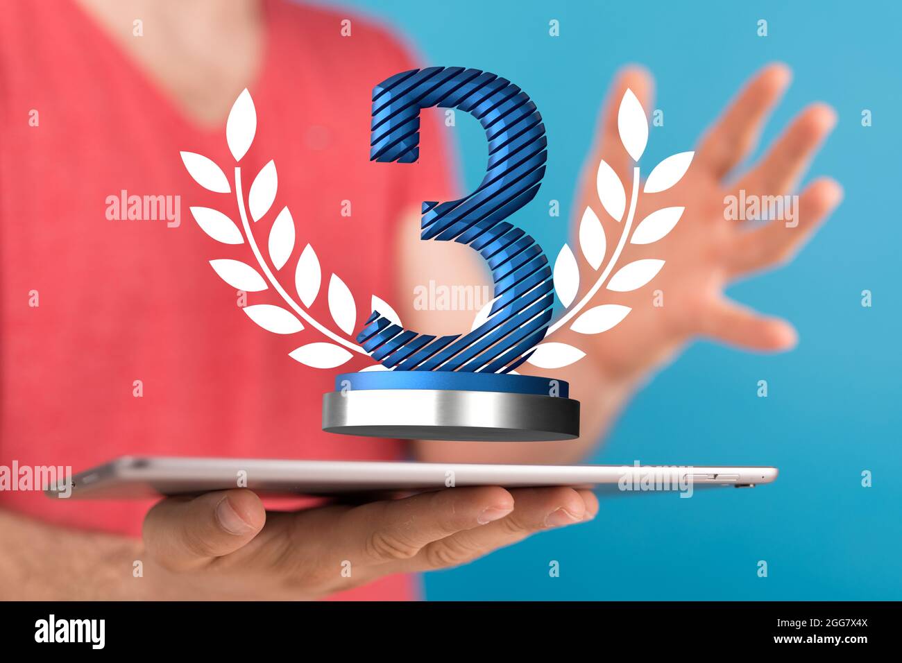 A 3D rendered 3rd place trophy hovering over a tablet Stock Photo - Alamy