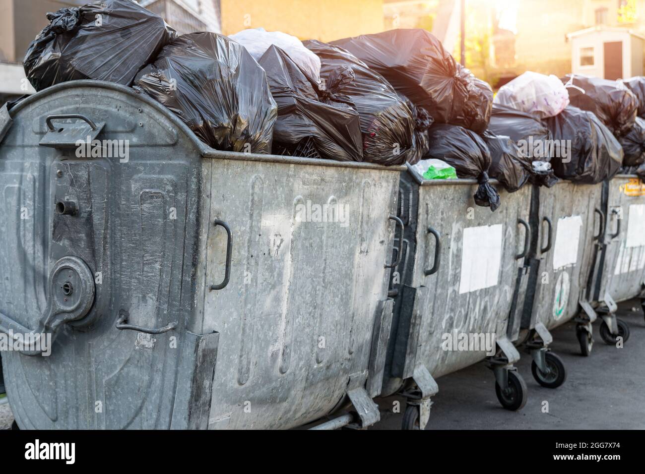 Dustbin many garbage bags hi-res stock photography and images - Alamy