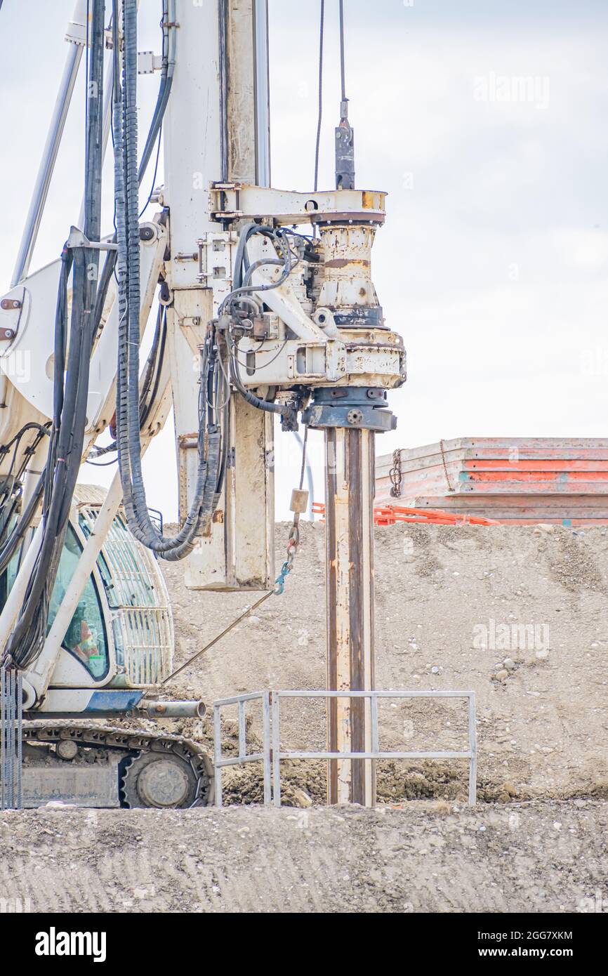 Construction Site - Heavy industrial drilling machine at road works ...