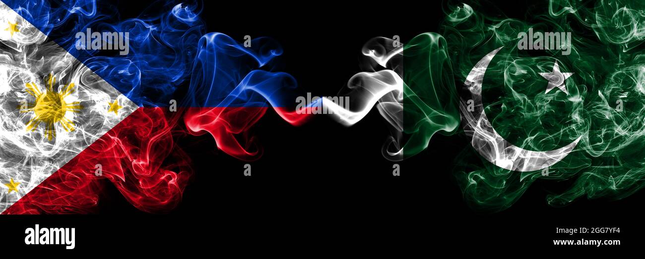 Philippines, Filipino vs Pakistan, Pakistani smoke flags side by side ...