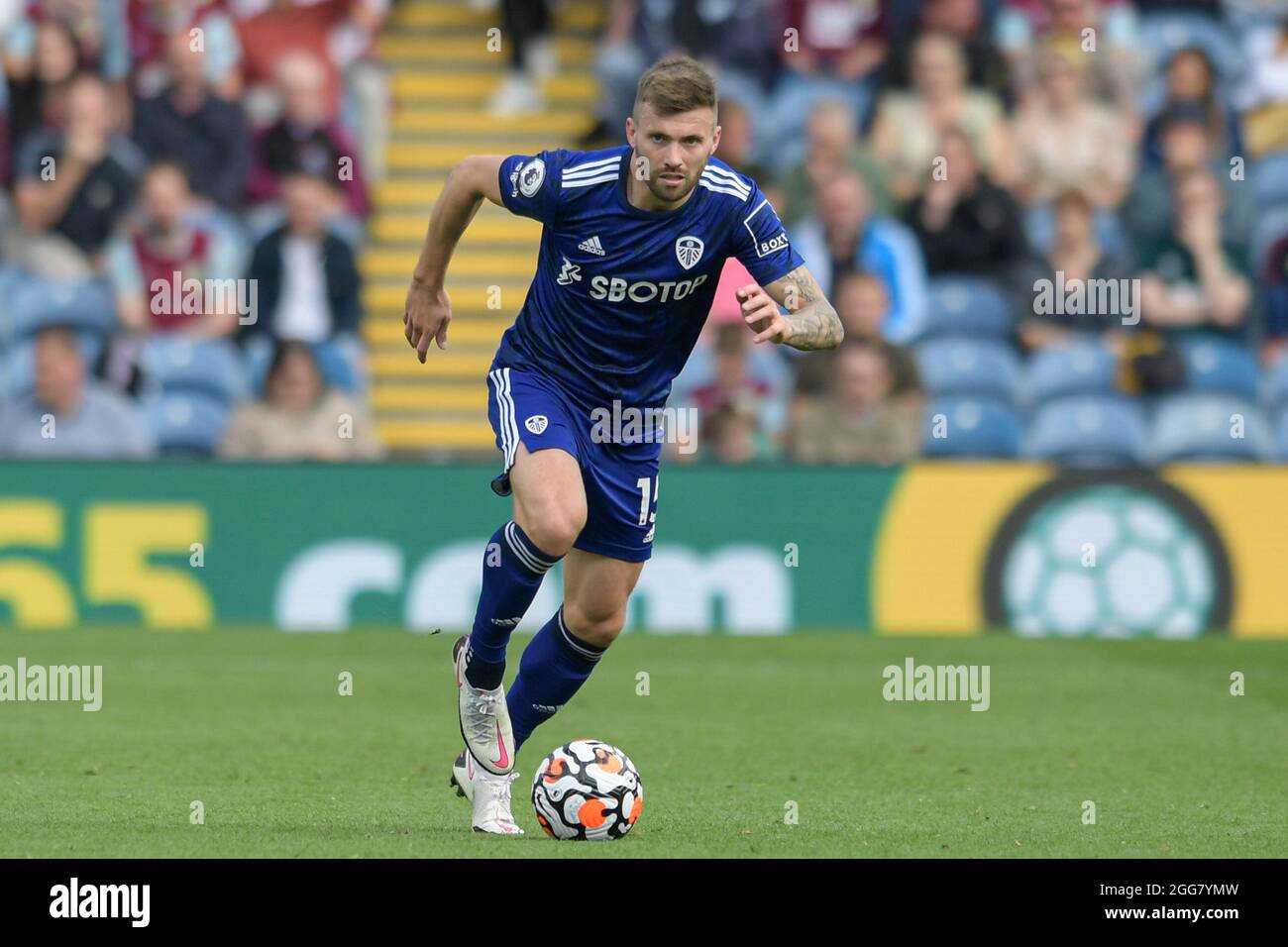 Burnley, UK. 29th Aug, 2021. Stuart Dallas #15 of Leeds United runs ...
