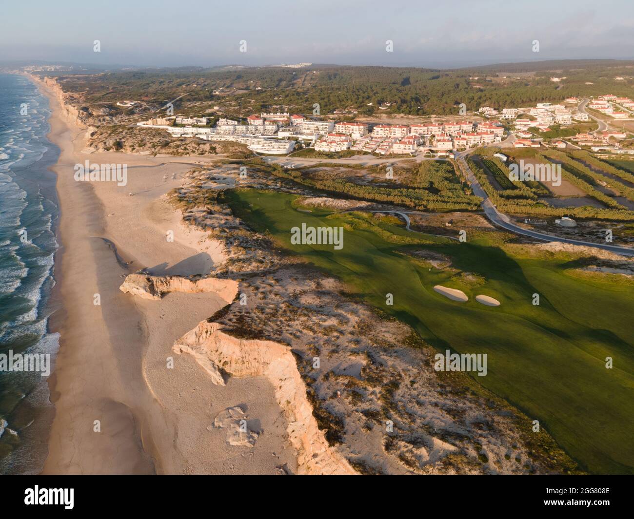 View of the Atlantic ocean and Praia d`El Rey beach at sunset, near ...
