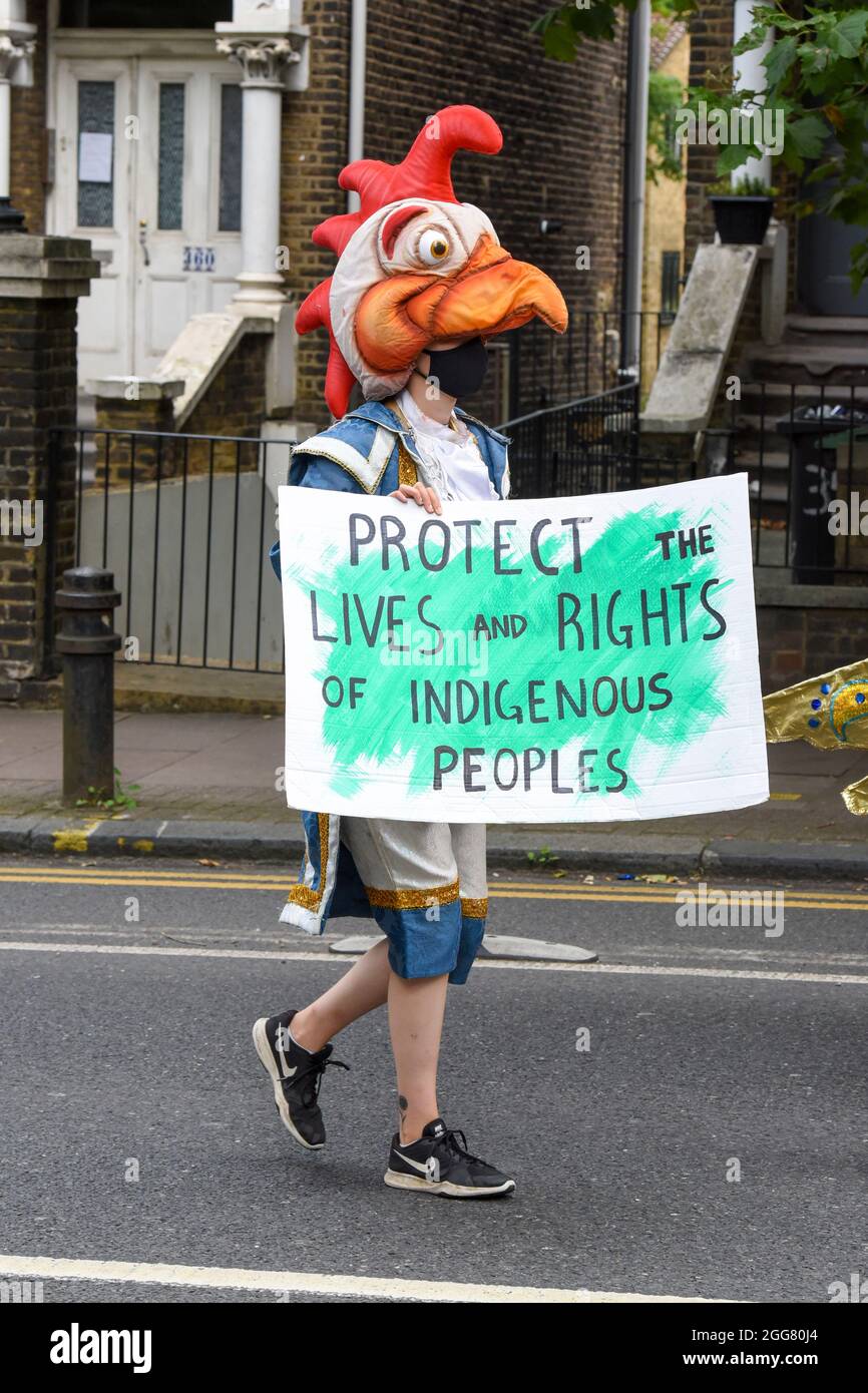 London, UK. 29th Aug, 2021. A protester dressed as a bird is seen ...
