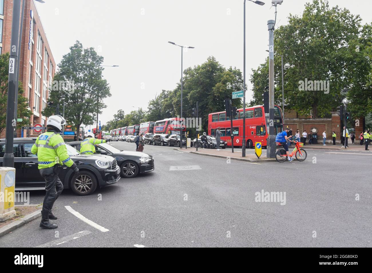 London, UK. 29th Aug, 2021. A lines of Buses and cars stuck due to ...