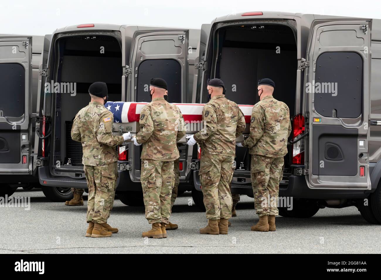 A U.S. Army carry team transfers the remains of Army Staff Sgt. Ryan C ...