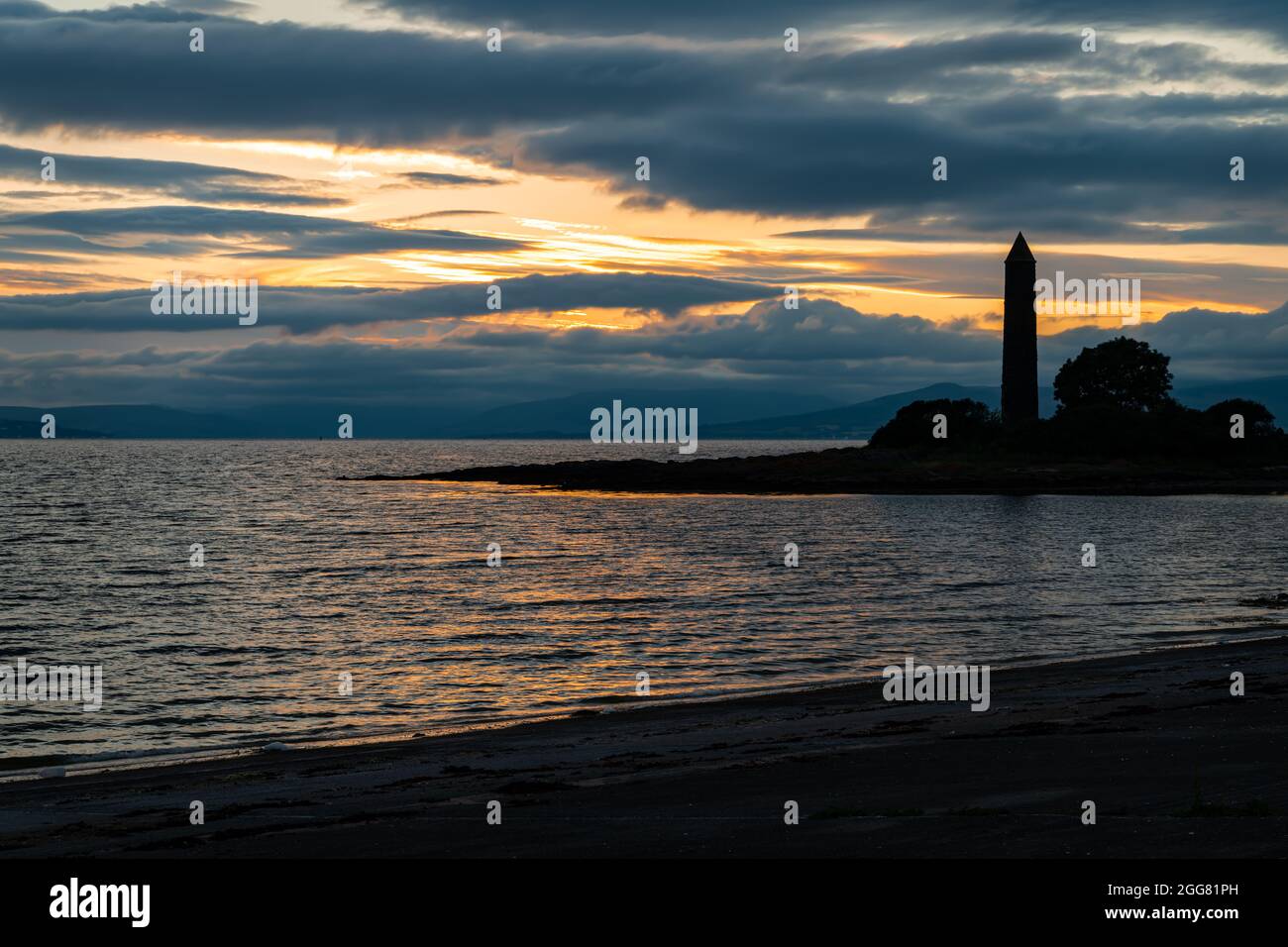Silhouette of the Battle of Largs Pencil Monument at sunset, Largs ...