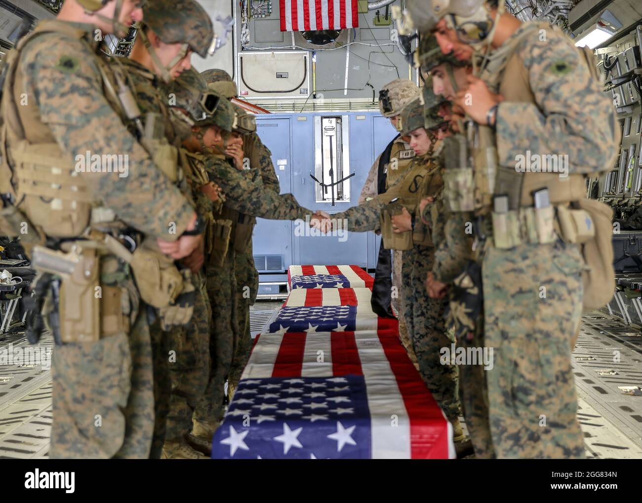 United States Marines honor their fallen during a Ramp Ceremony at ...