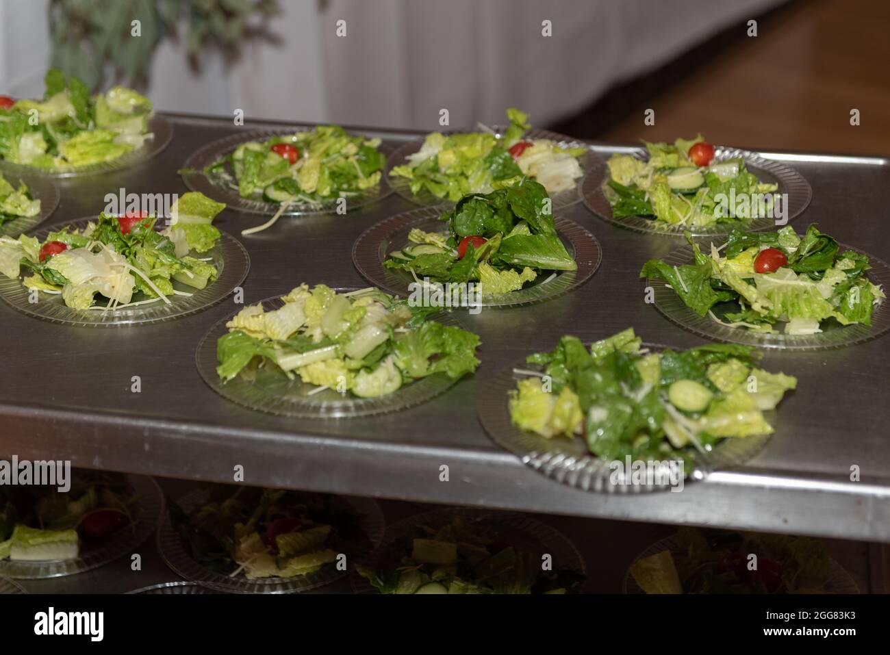 Salad cart has many dinner salads to serve to all the guests of the ...