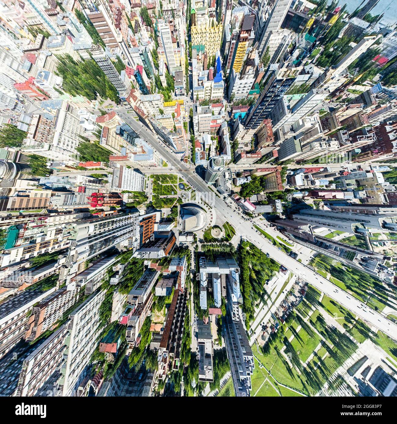 Aerial city view with crossroads, roads, houses, buildings, parks and ...