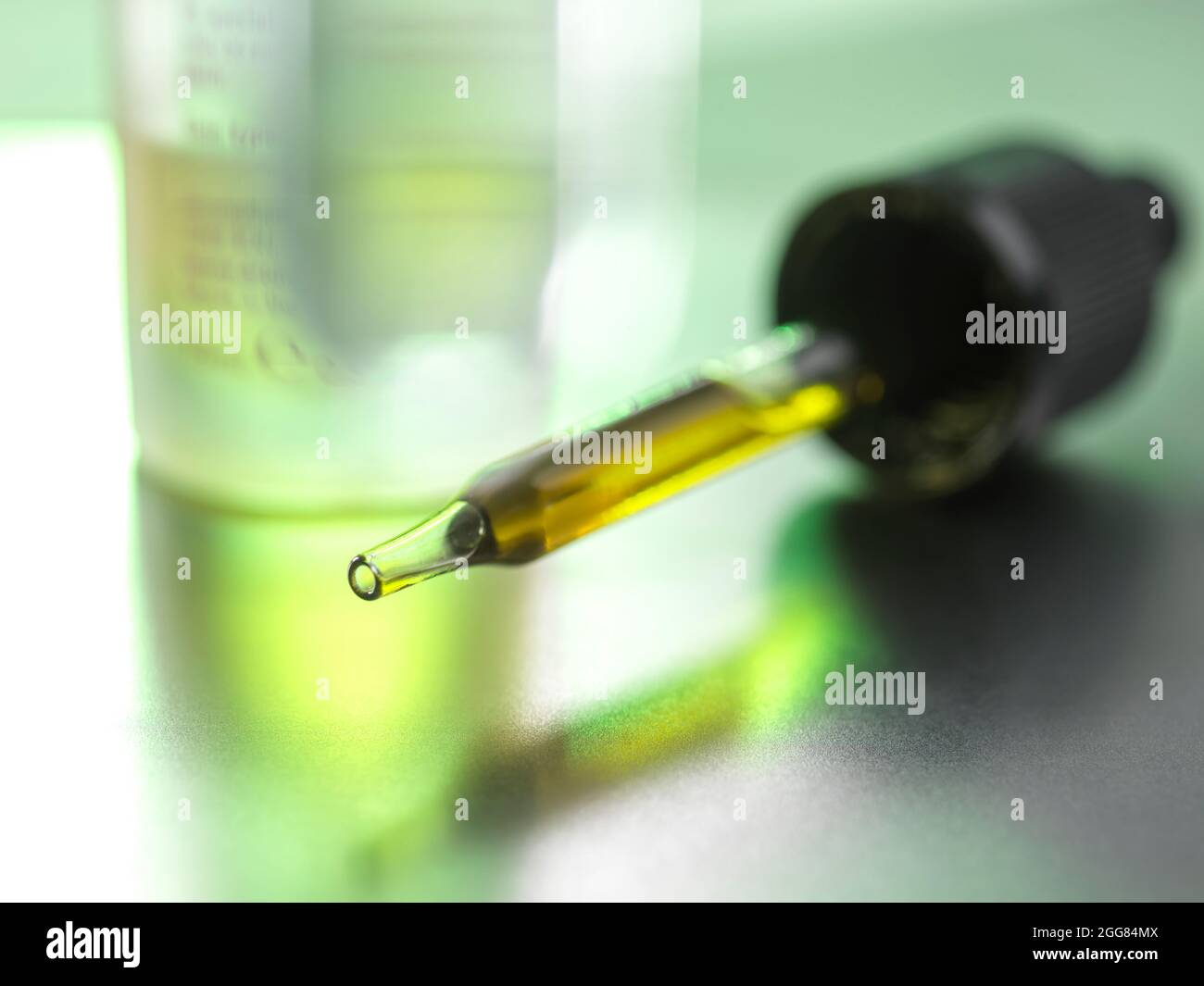 Pipette with essential oil Stock Photo - Alamy