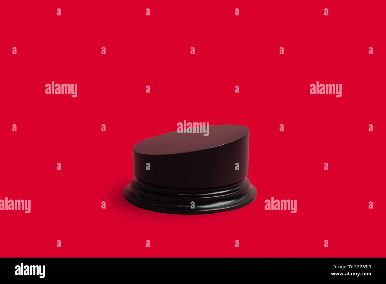 Single wooden geometric podium on red background with copy space Stock ...