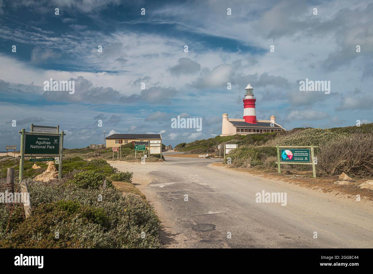 An entrance road to Cape Agulhas National Park with Cape Agulhas ...
