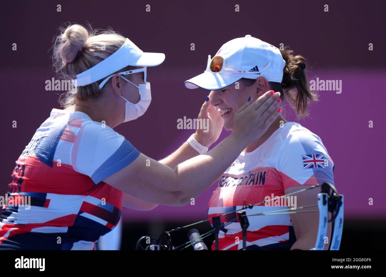 Great Britain's Phoebe Paterson Pine celebrates with her coach after ...