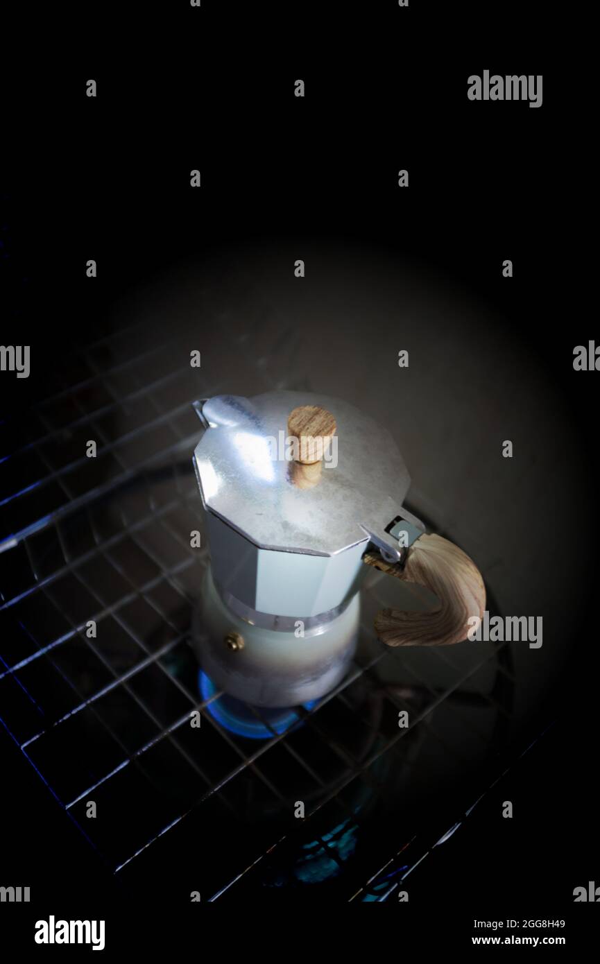 Mokapot coffee pot on gas stove Stock Photo - Alamy