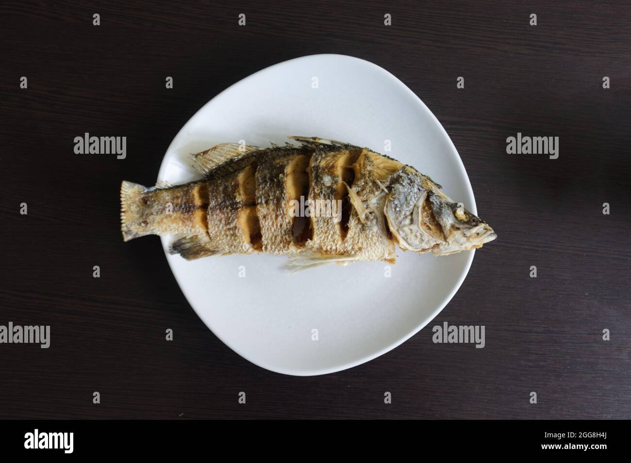 Deep fried bass fish hi-res stock photography and images - Alamy