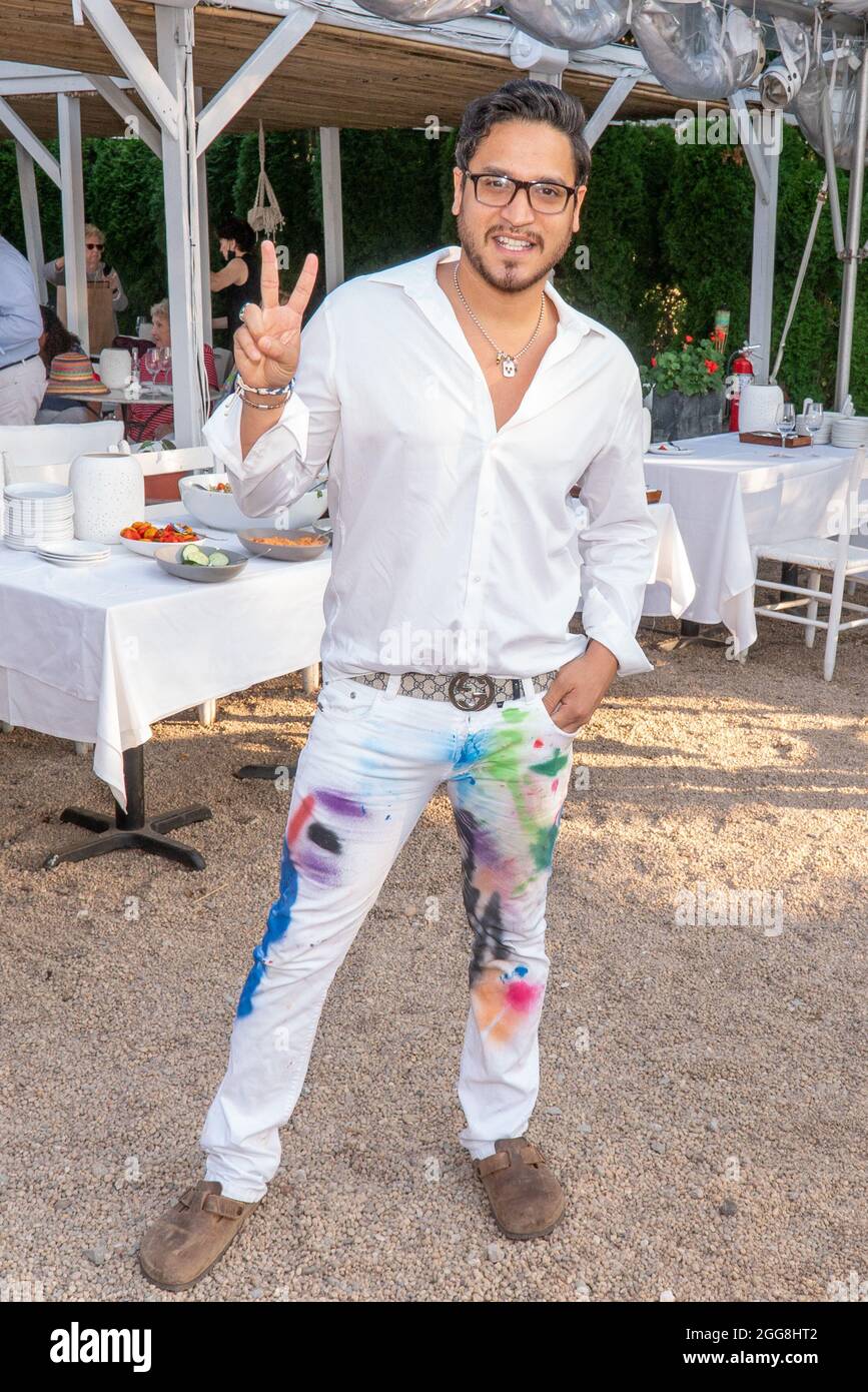 Mago Art attends Dan's Papers Out East End Impact Awards at Calissa in ...