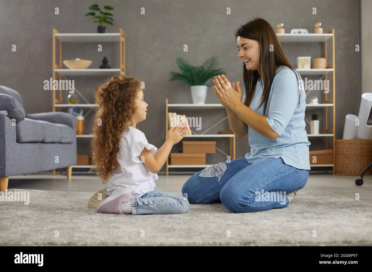 Clapping joy hi-res stock photography and images - Alamy