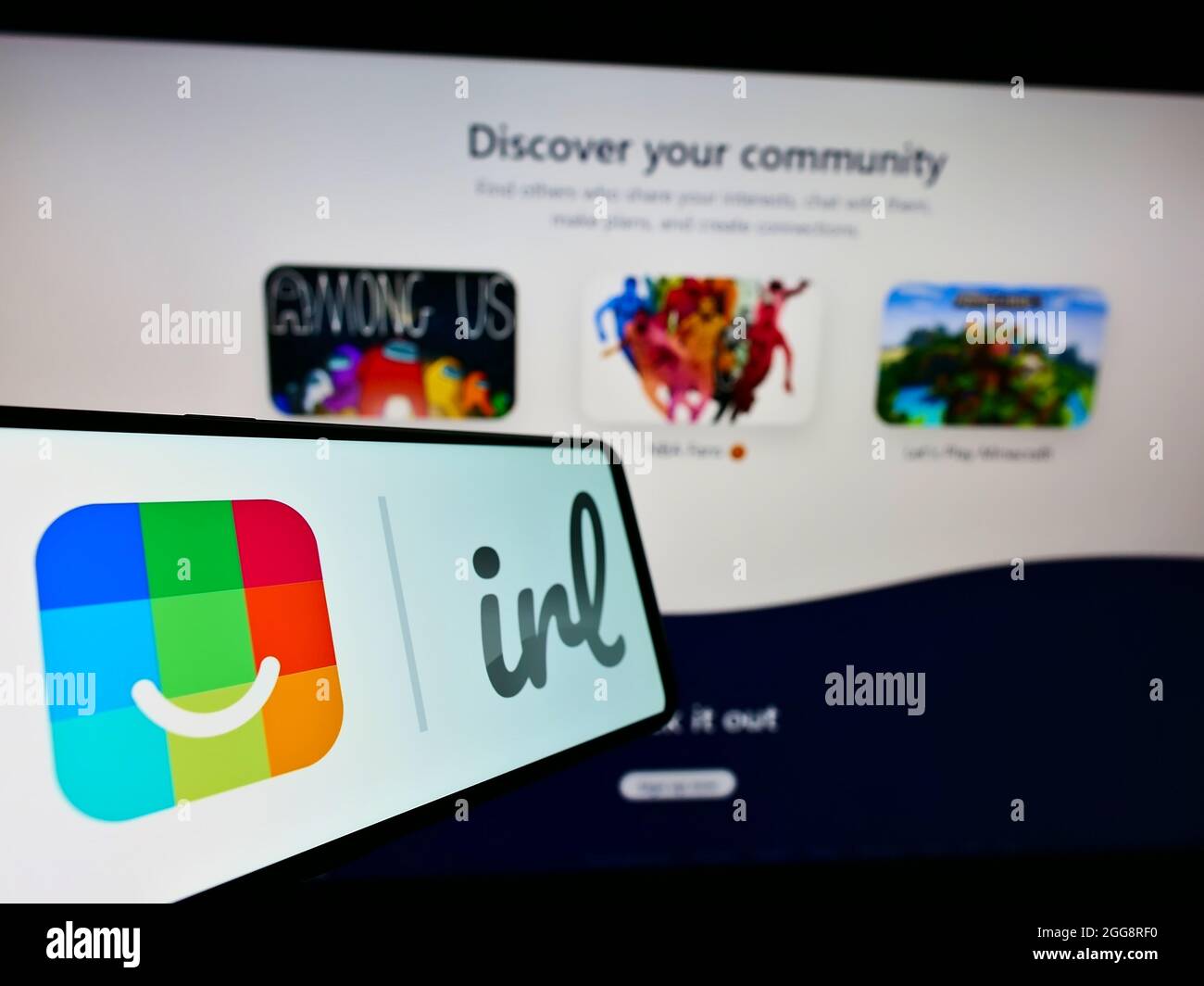 Cellphone with logo of US social network IRL (Get Together Inc.) on ...