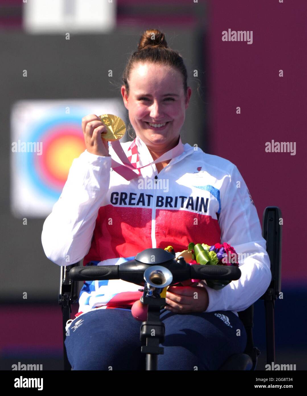 Great Britain's Phoebe Paterson Pine poses on the podium with her gold ...