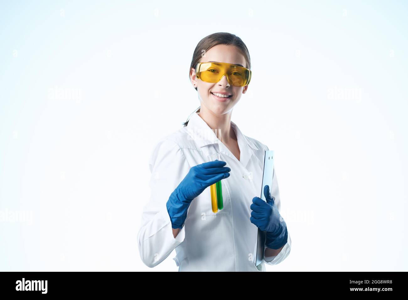 female laboratory assistant chemical solution biotechnology ...