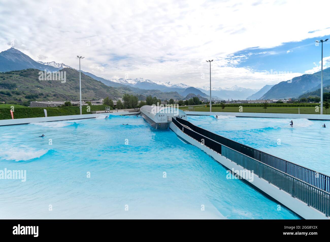 Surf wave pool in Switzerland. Alaia bay and Wave Garden in Sion ...