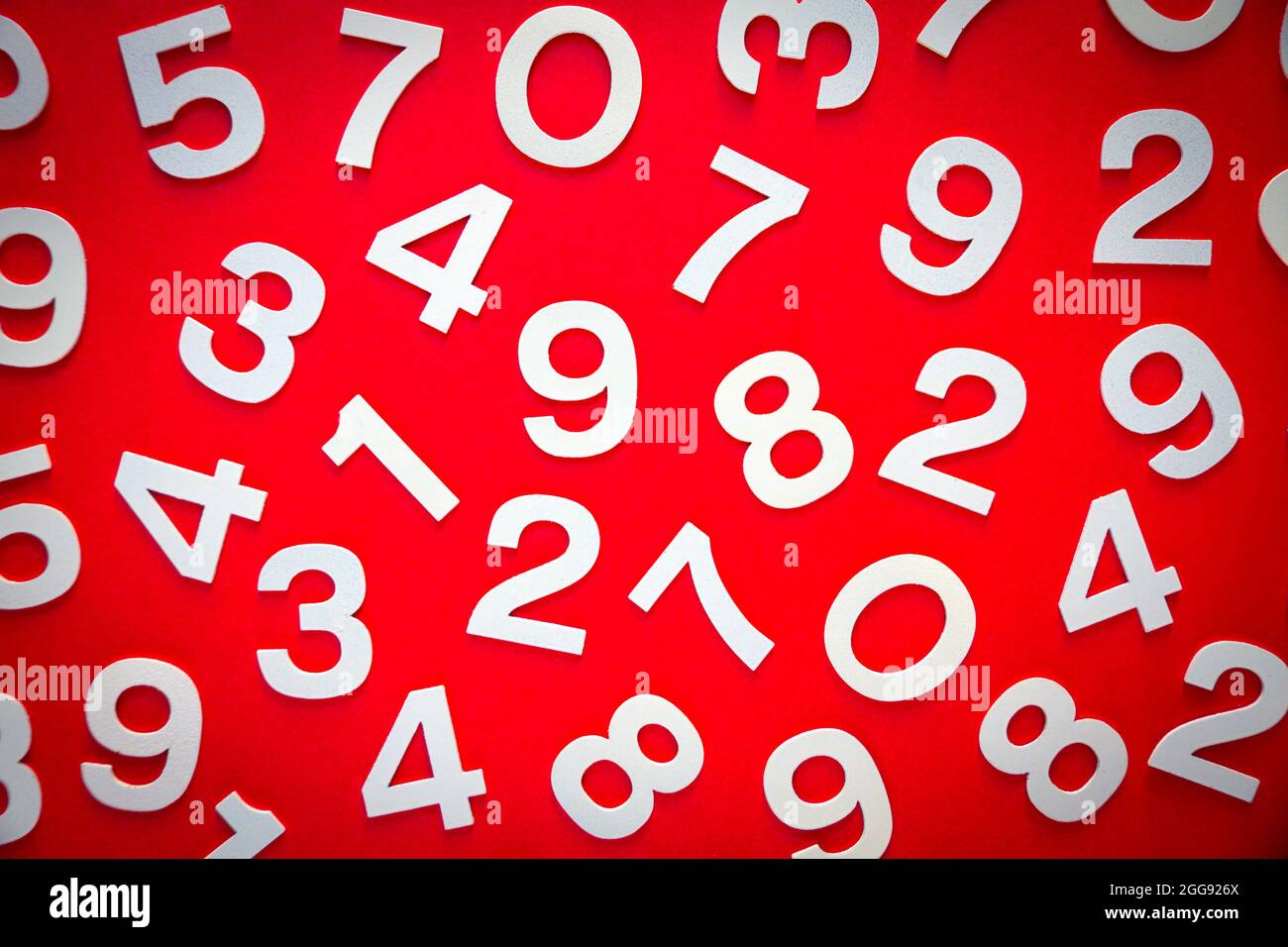 Mathematics background made with solid numbers on a board. Top view ...