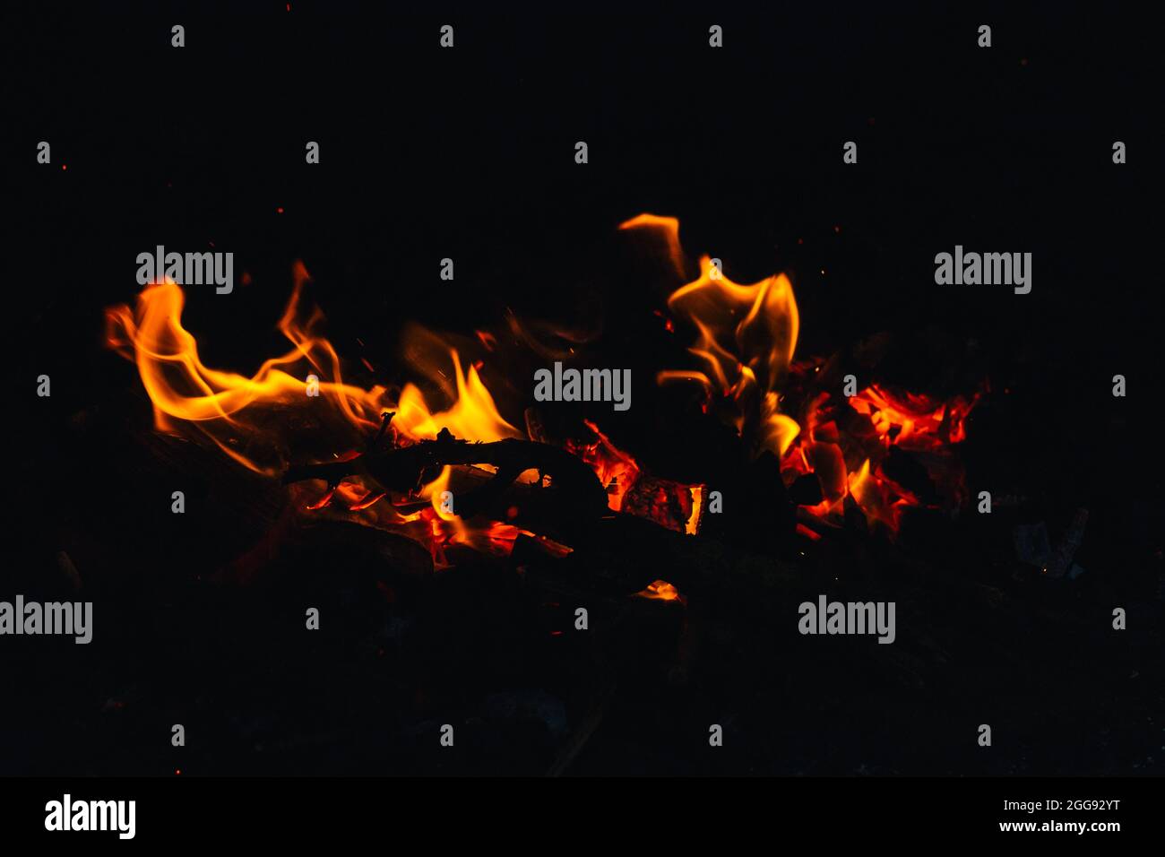 intense and lively fire from a bonfire creating danger Stock Photo - Alamy