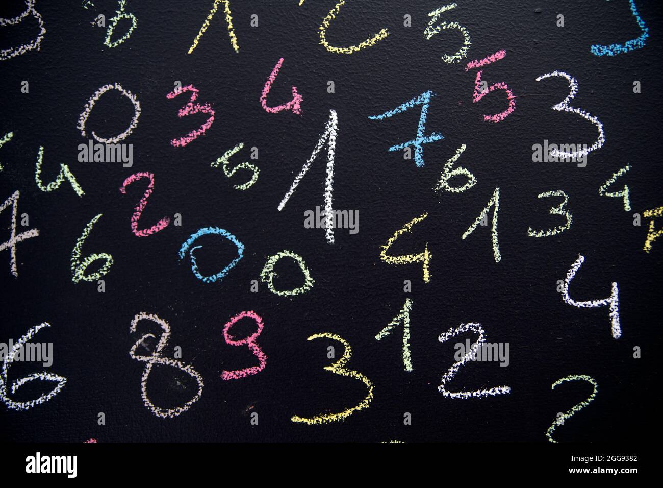 Graphic representation with chalk on blackboard with colorful numbers ...