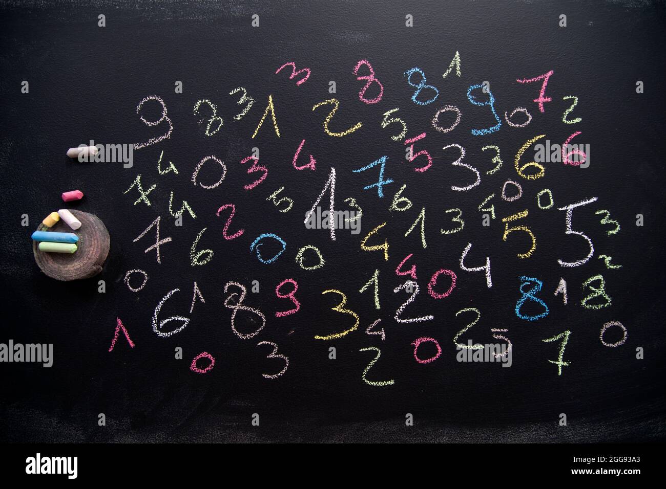 Graphic representation with chalk on blackboard with colorful numbers ...
