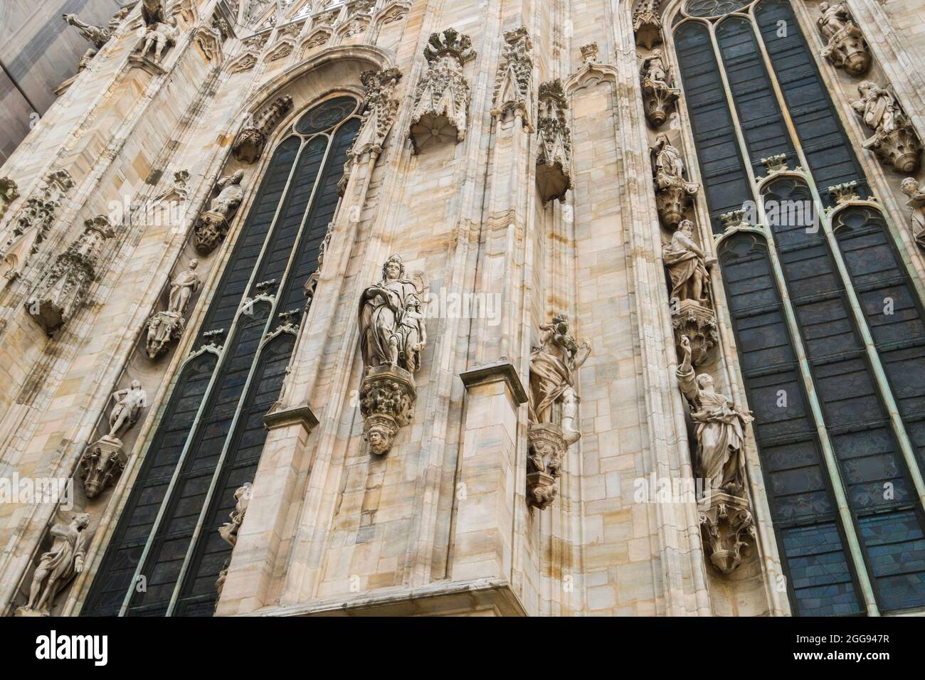 A detail, close up of one of the many holy, angel statues, sculptures ...