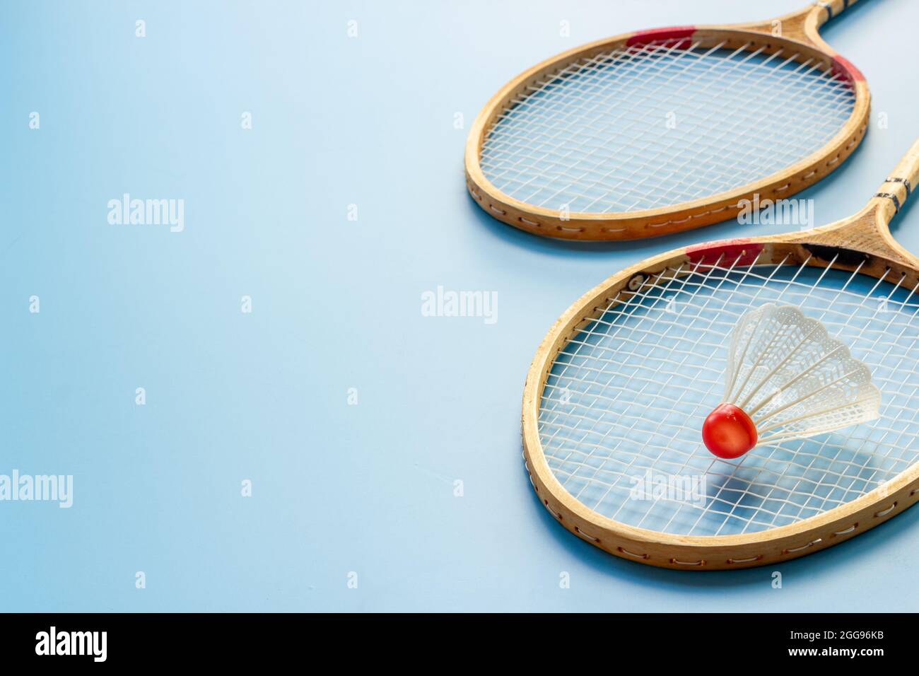 Two badminton rackets and shuttlecock close up Stock Photo - Alamy